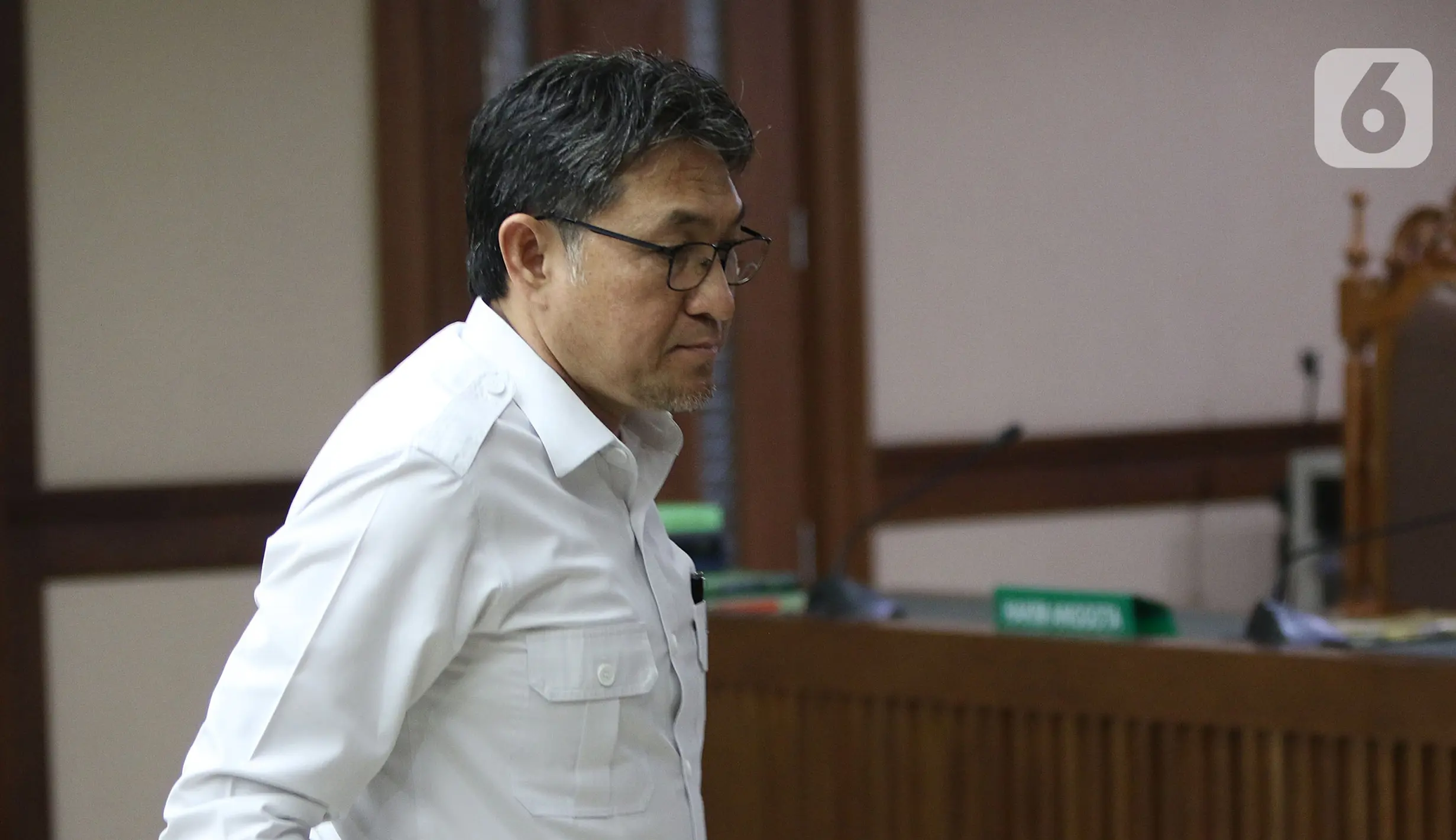 FOTO: Mantan Anggota DPR Sukiman Jalani Sidang Dakwaan - Foto Liputan6.com