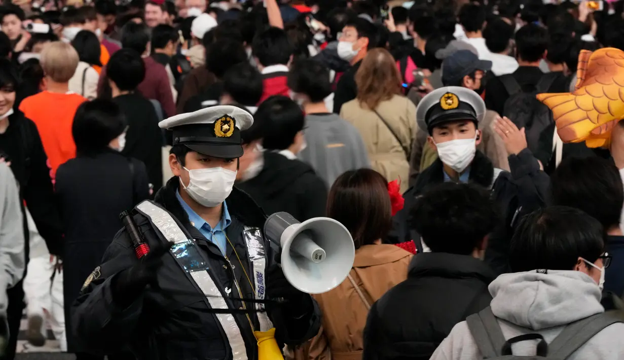 Polisi Jepang Jaga Ketat Perayaan Halloween di Tokyo - Foto Liputan6.com