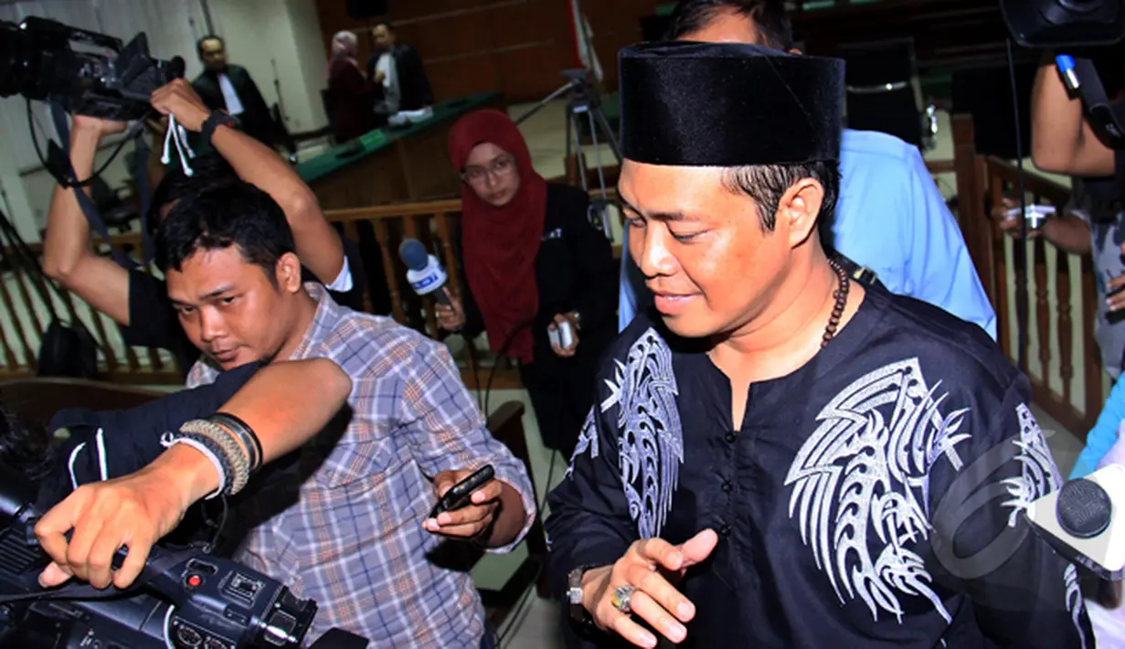 Tampang Muhtar Ependy Usai Divonis 5 Tahun Penjara - Foto Liputan6.com