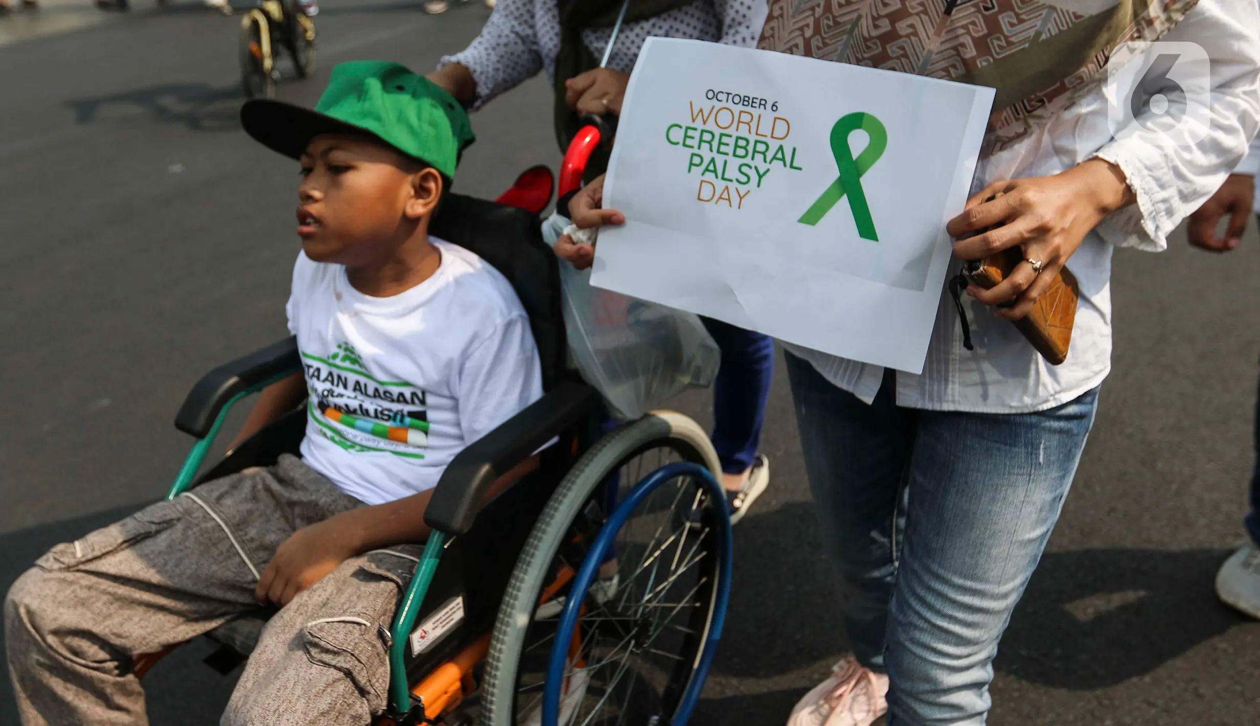 Kampanye World Cerebral Palsy Day di Car Free Day - Foto Liputan6.com