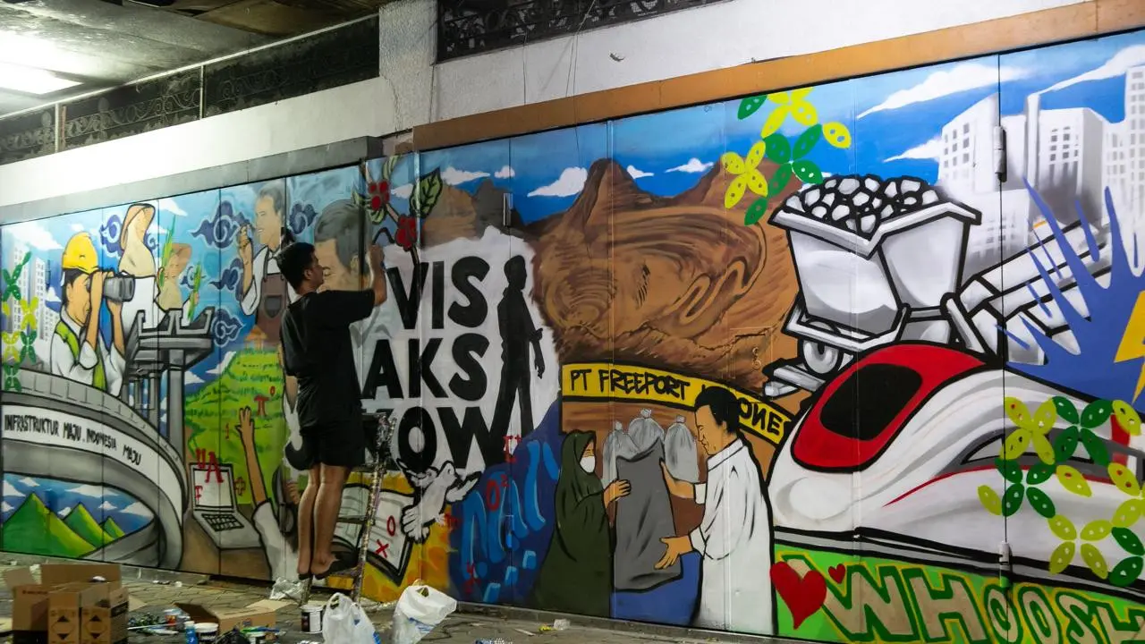 Mural Anak Muda Solo Ikut Sambut Kepulangan Jokowi