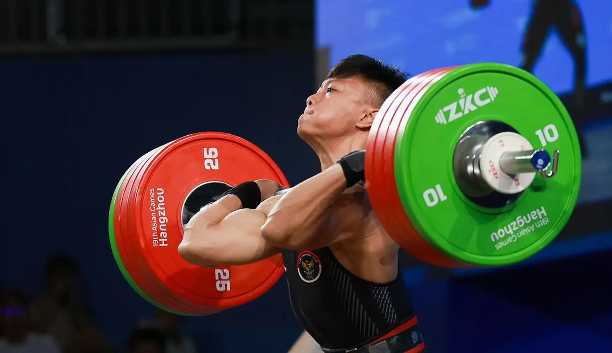 Foto: Aksi Rahmat Erwin Abdullah saat Pecahkan Rekor Dunia Angkat Besi ...