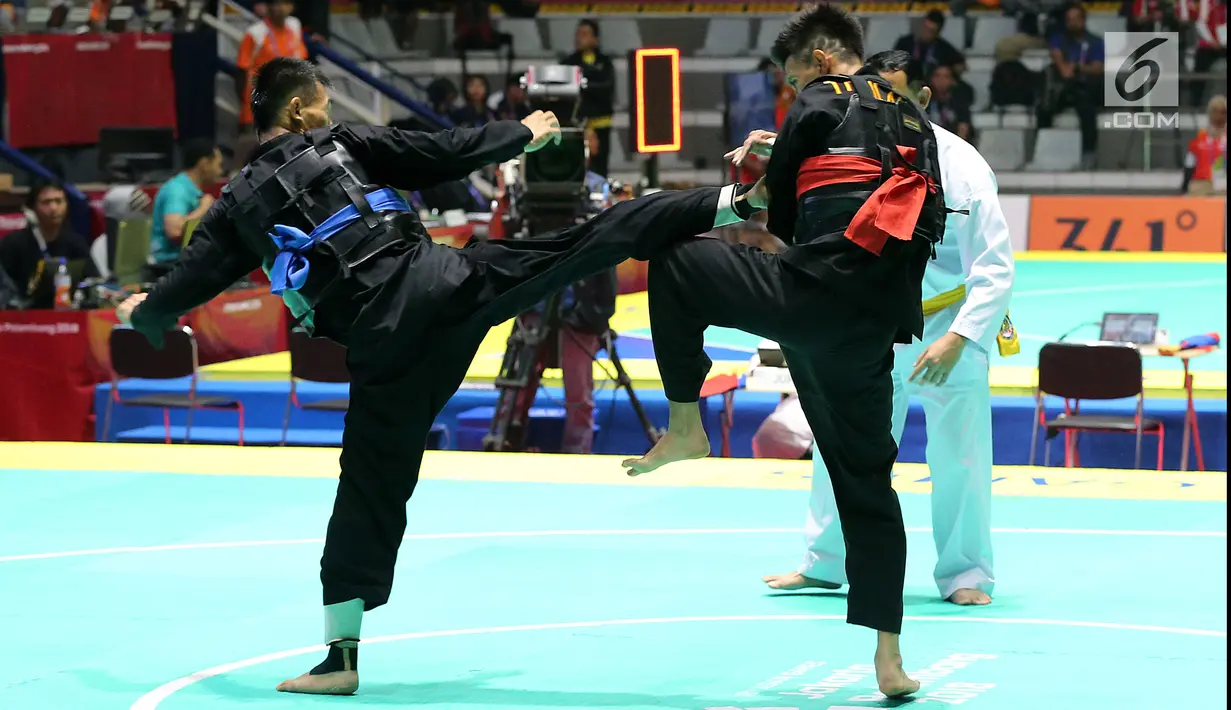 FOTO : Pesilat Indonesia, Iqbal Candra Pratama Masuk ke 8 Besar Asian Games 2018 - Foto Liputan6.com
