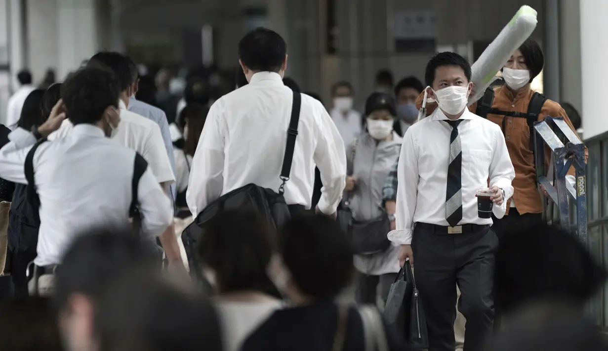 FOTO: Hiruk-Pikuk Jam Sibuk di Tokyo Usai Jepang Akhiri Darurat Covid-19 - Foto Liputan6.com