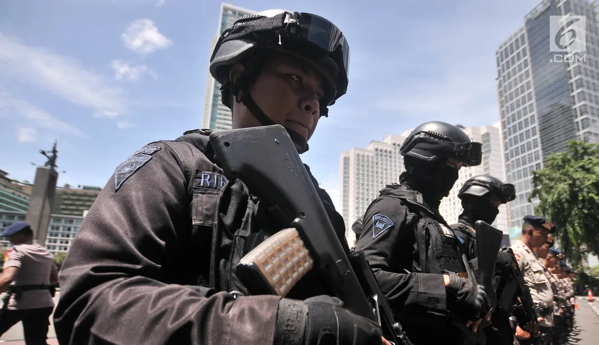 FOTO: Pengamanan Jelang Malam Tahun Baru 2019 - Foto Liputan6.com