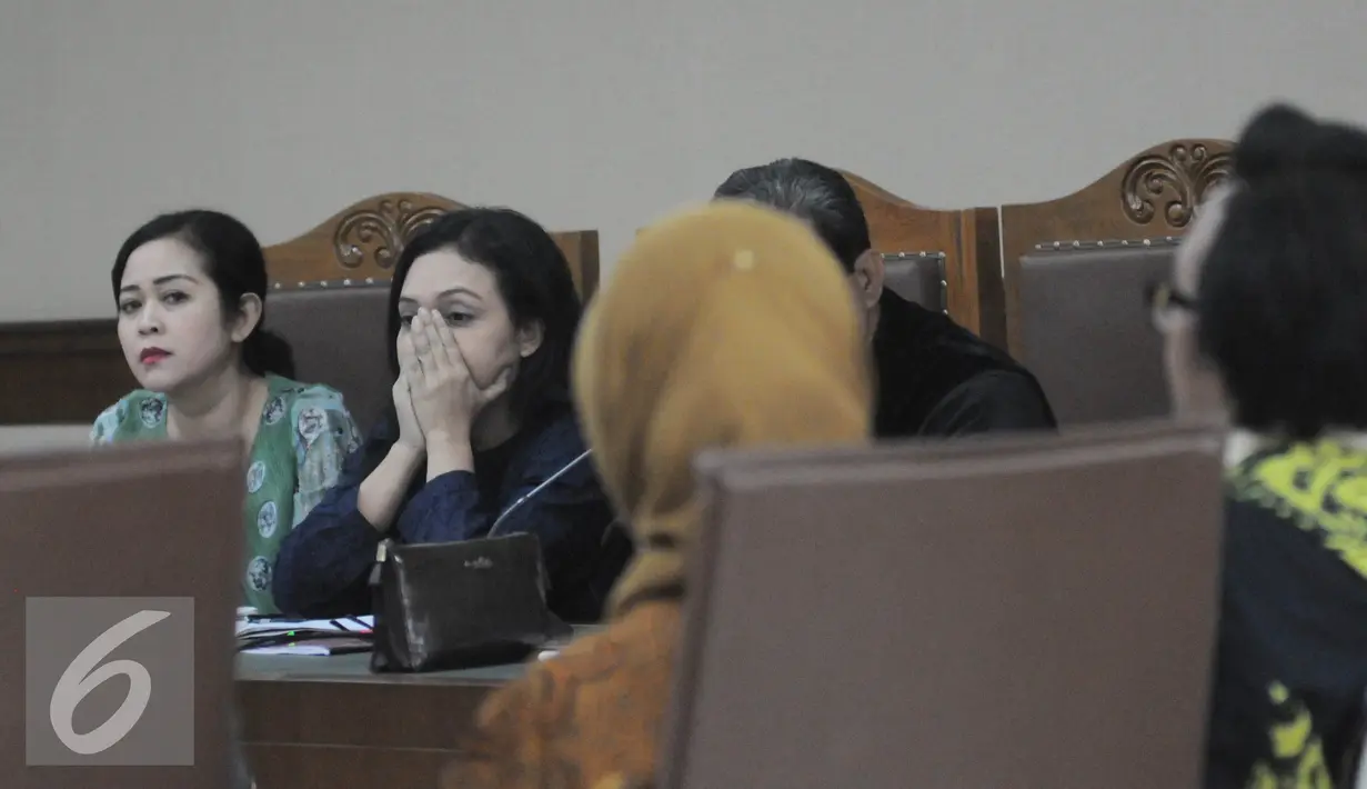 Ekspresi Dessy Ariyanti Edwin dan Julia Prasetyarini Saat Ikuti Sidang Lanjutan - Foto Liputan6.com