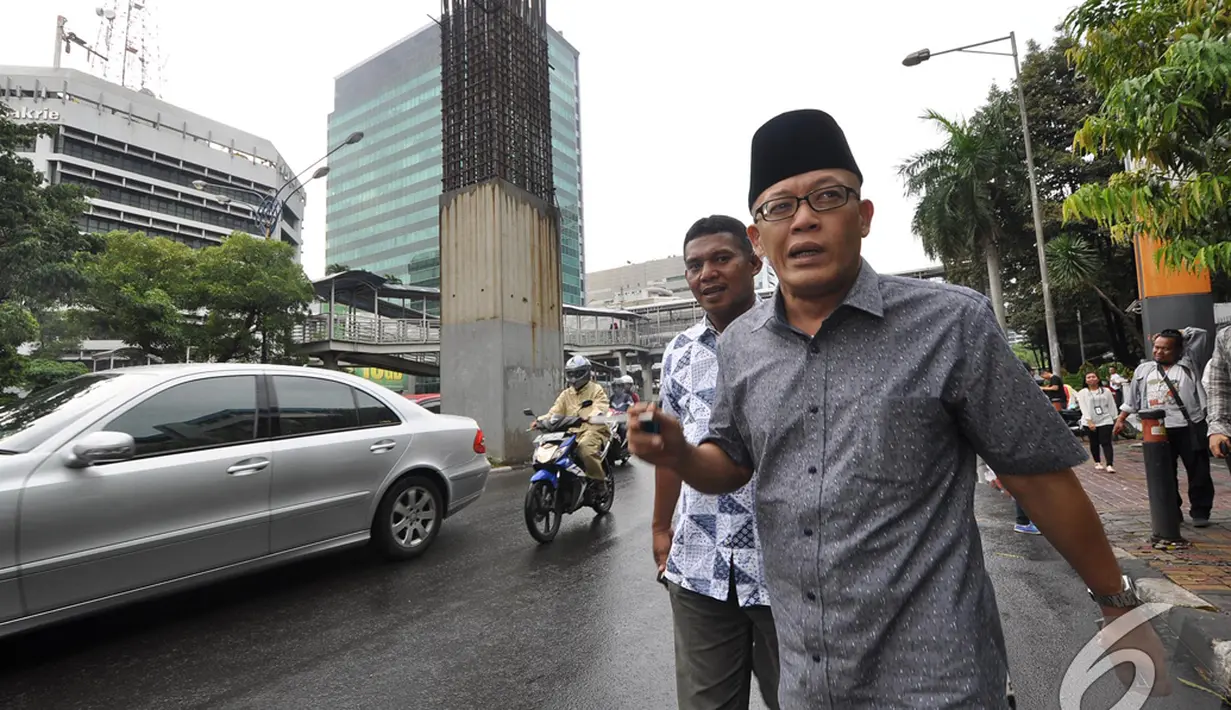 Tri Yulianto Hindari Wartawan Usai Diperiksa KPK - Foto Liputan6.com