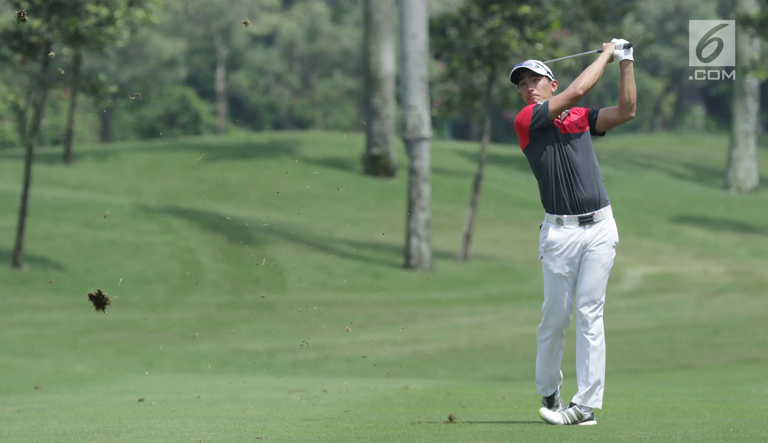 PHOTO: Aksi Danny Masrin dan Rory Hie di Golf Indonesia Open 2017 - Foto Liputan6.com