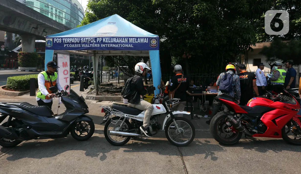 DKI Jakarta Mulai Uji Coba Tilang Uji Emisi Kendaraan Bermotor - Foto Liputan6.com