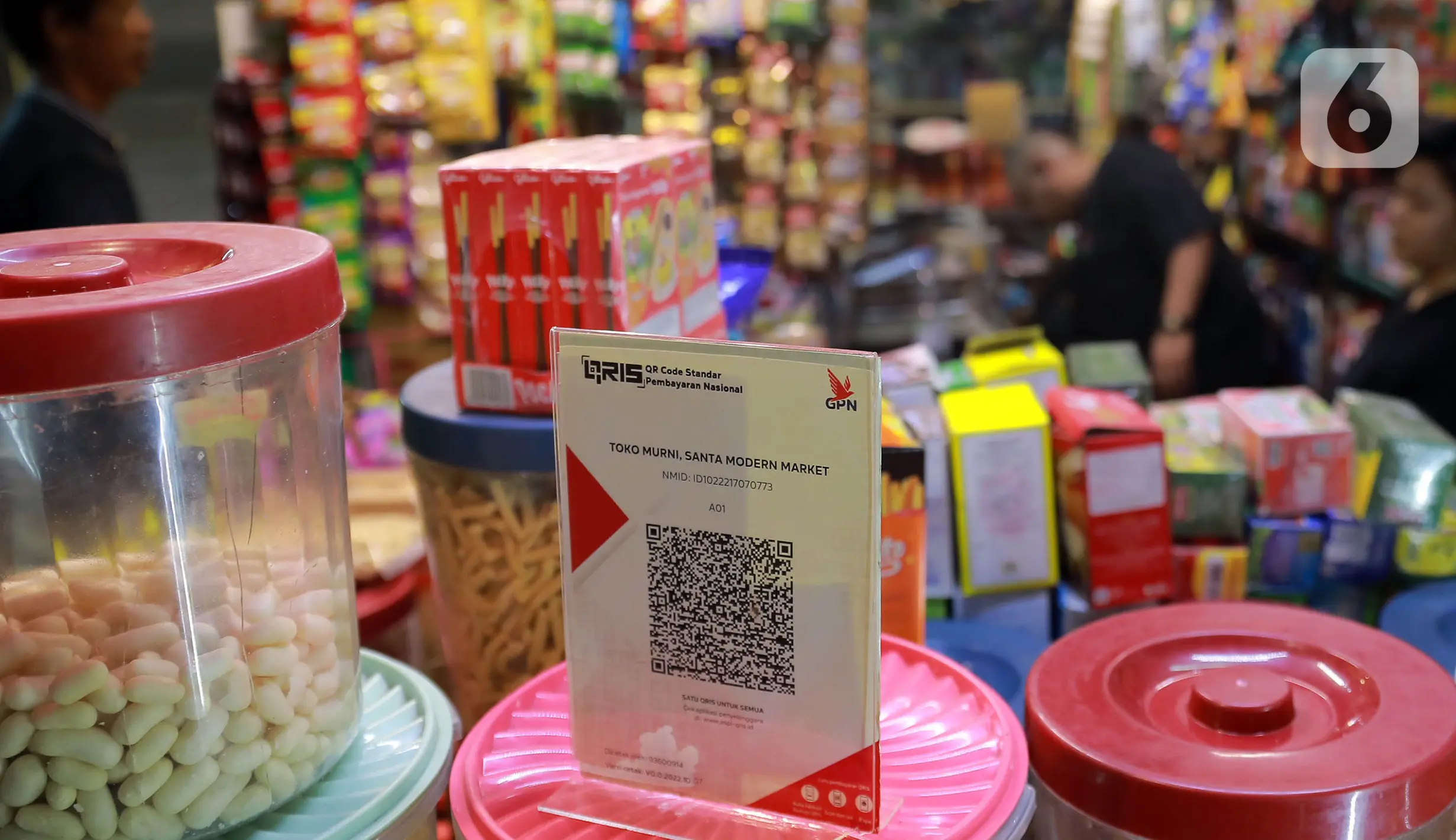 Pedagang Kena Tarif Qris per Juli 2023 - Foto Liputan6.com
