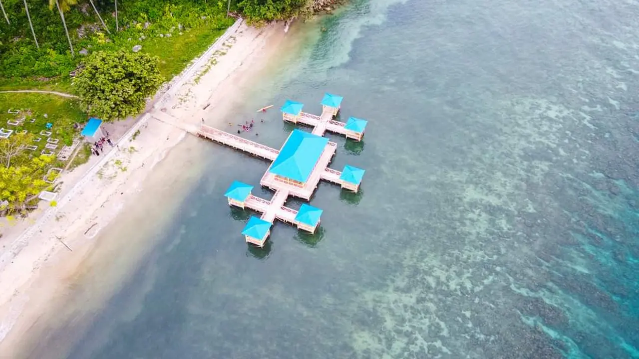 Santai Sejenak di 'Rest Area' Pantai Pinomontiga Jalur Trans Sulawesi ...