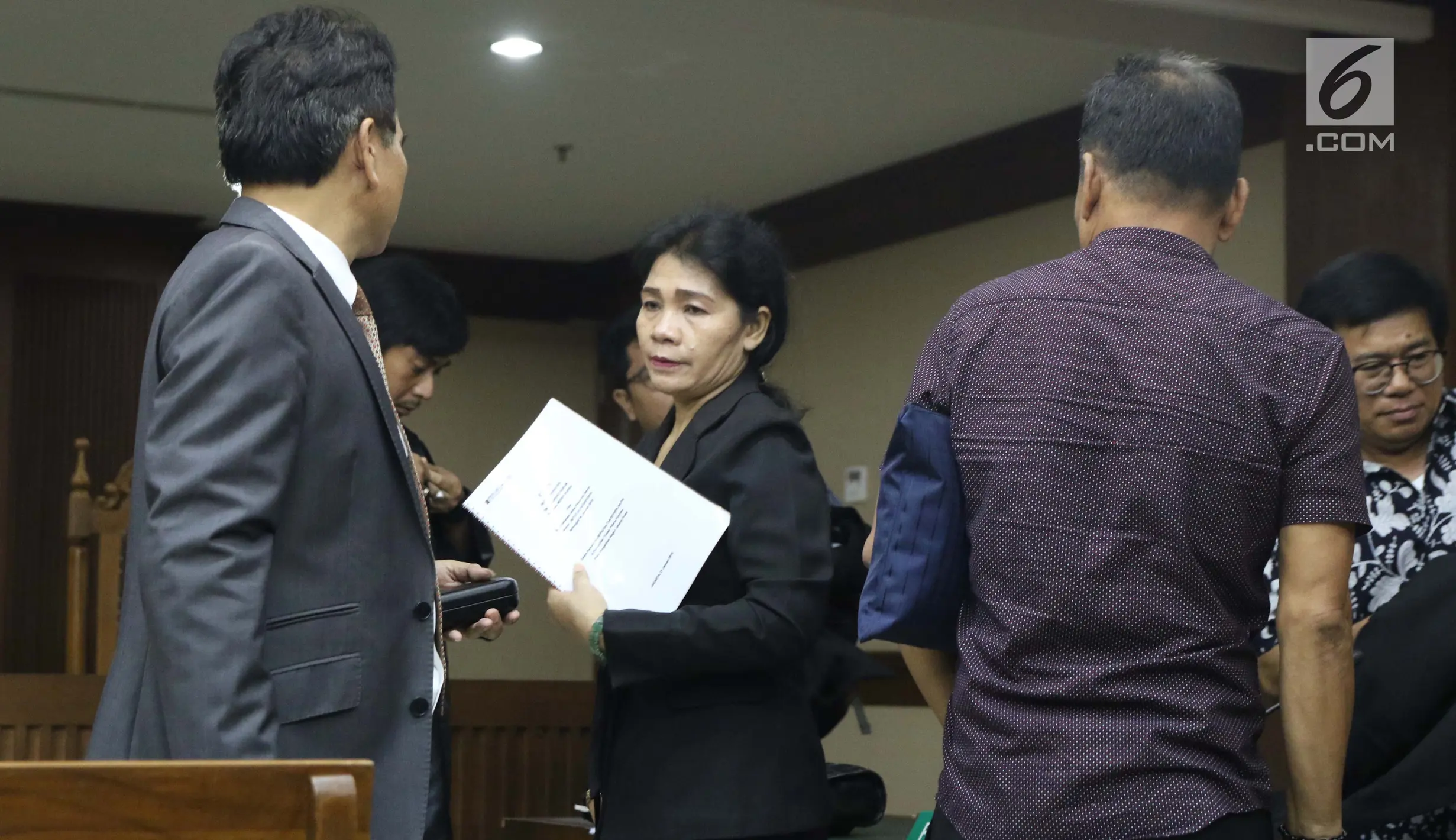 FOTO: Didakwa Terima Suap, Merry Purba Sampaikan Eksepsi - Foto Liputan6.com