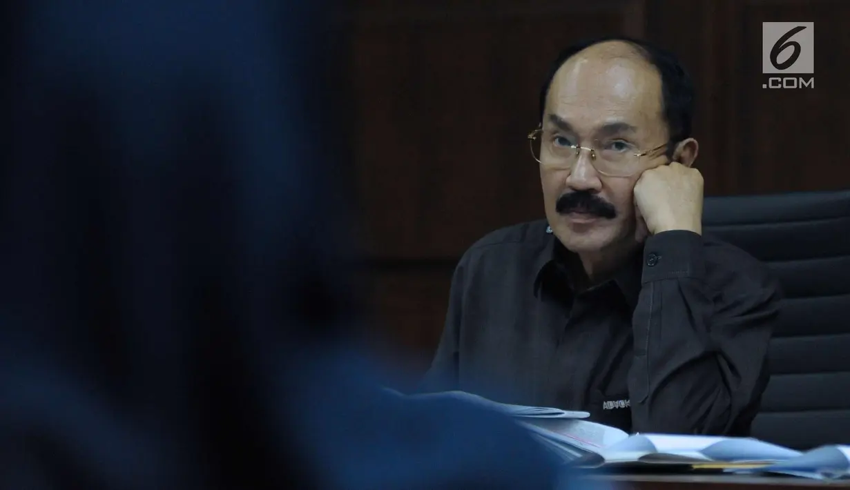 FOTO: Mantan Pengacara Setya Novanto Kembali Jalani Sidang Lanjutan - Foto Liputan6.com