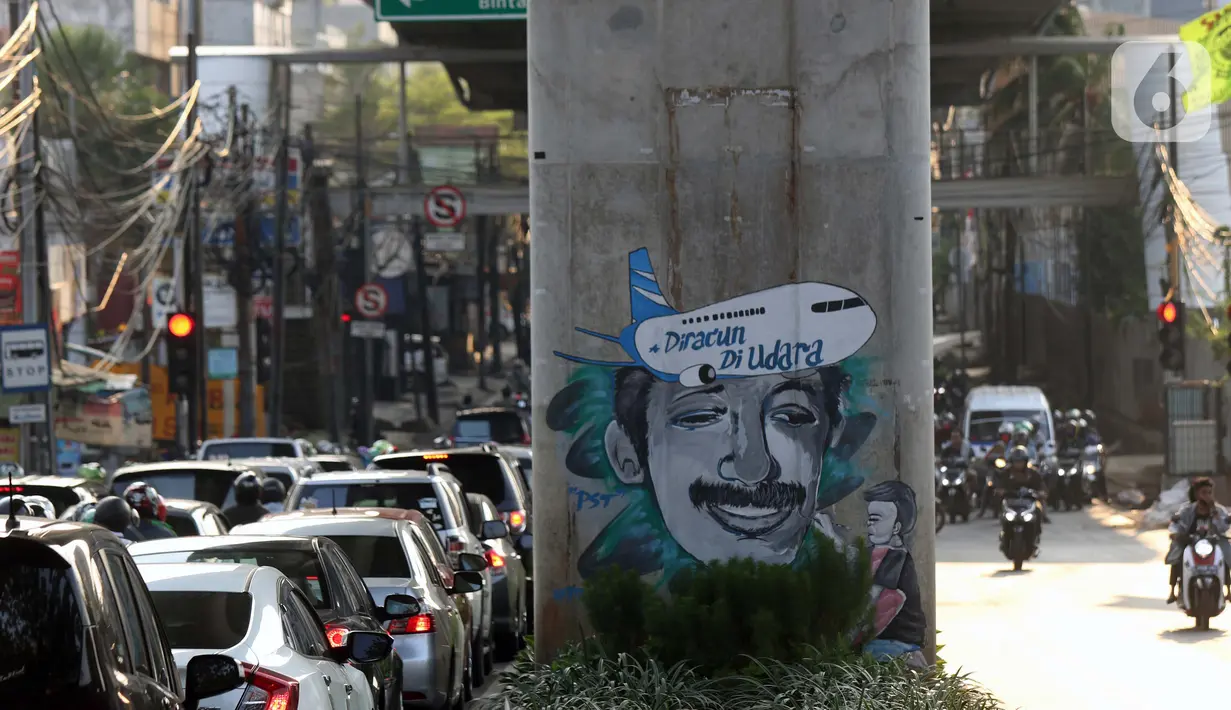 FOTO: Mural Mengenang Munir - Foto Liputan6.com