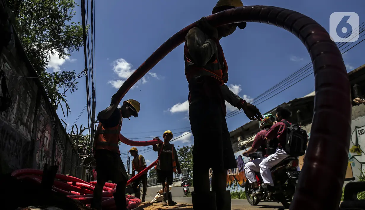FOTO: Program Bantuan Pemerintah untuk Pekerja Informal - Foto Liputan6.com