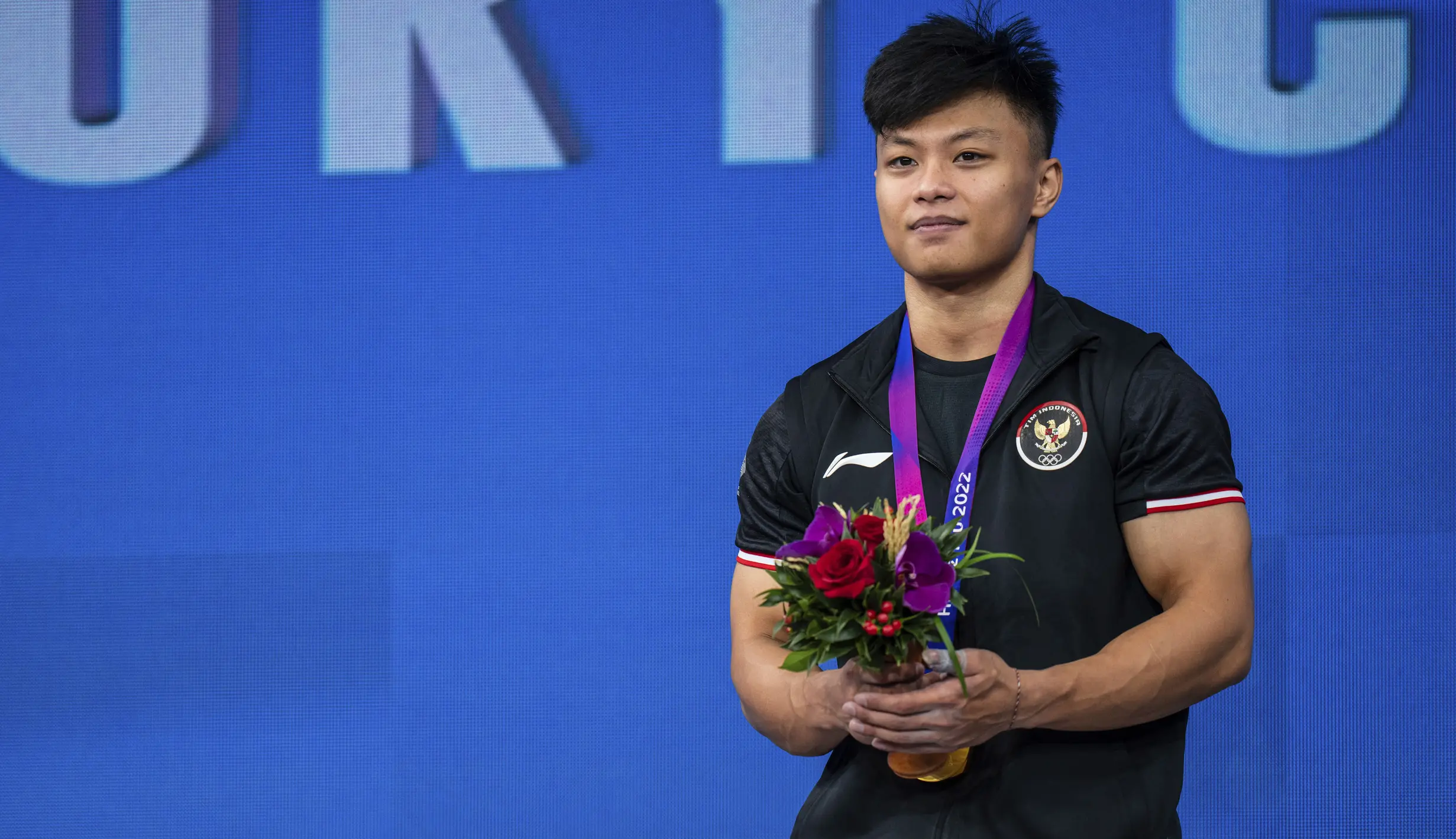 Foto: Aksi Rahmat Erwin Abdullah saat Pecahkan Rekor Dunia Angkat Besi ...