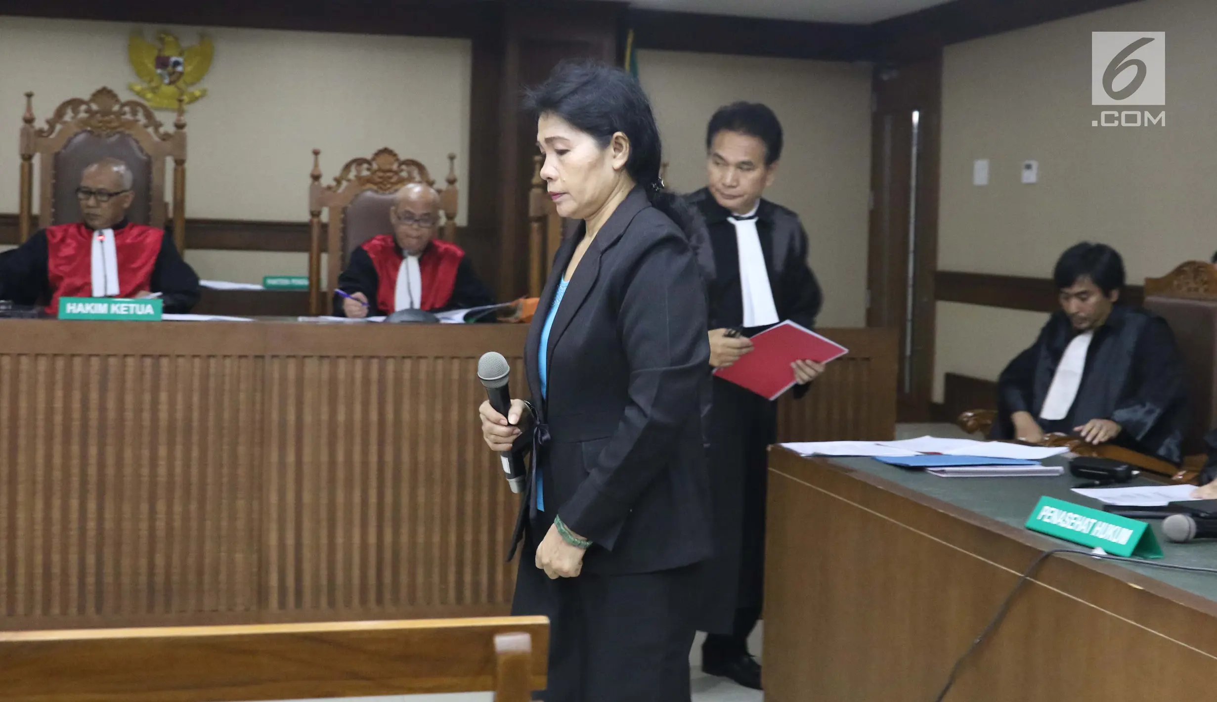 FOTO: Didakwa Terima Suap, Merry Purba Sampaikan Eksepsi - Foto Liputan6.com