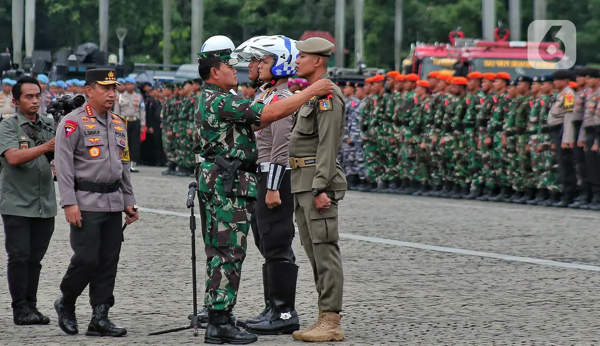 Panglima TNI dan Kapolri Pimpin Apel Operasi Lilin 2022 di Monas - Foto Liputan6.com