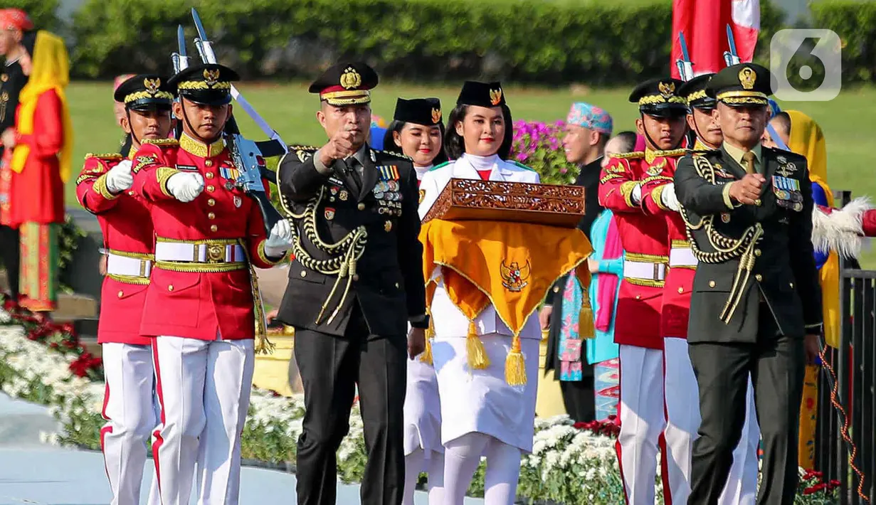 Prosesi Kirab Bendera Merah Putih Menuju IKN - Foto Liputan6.com