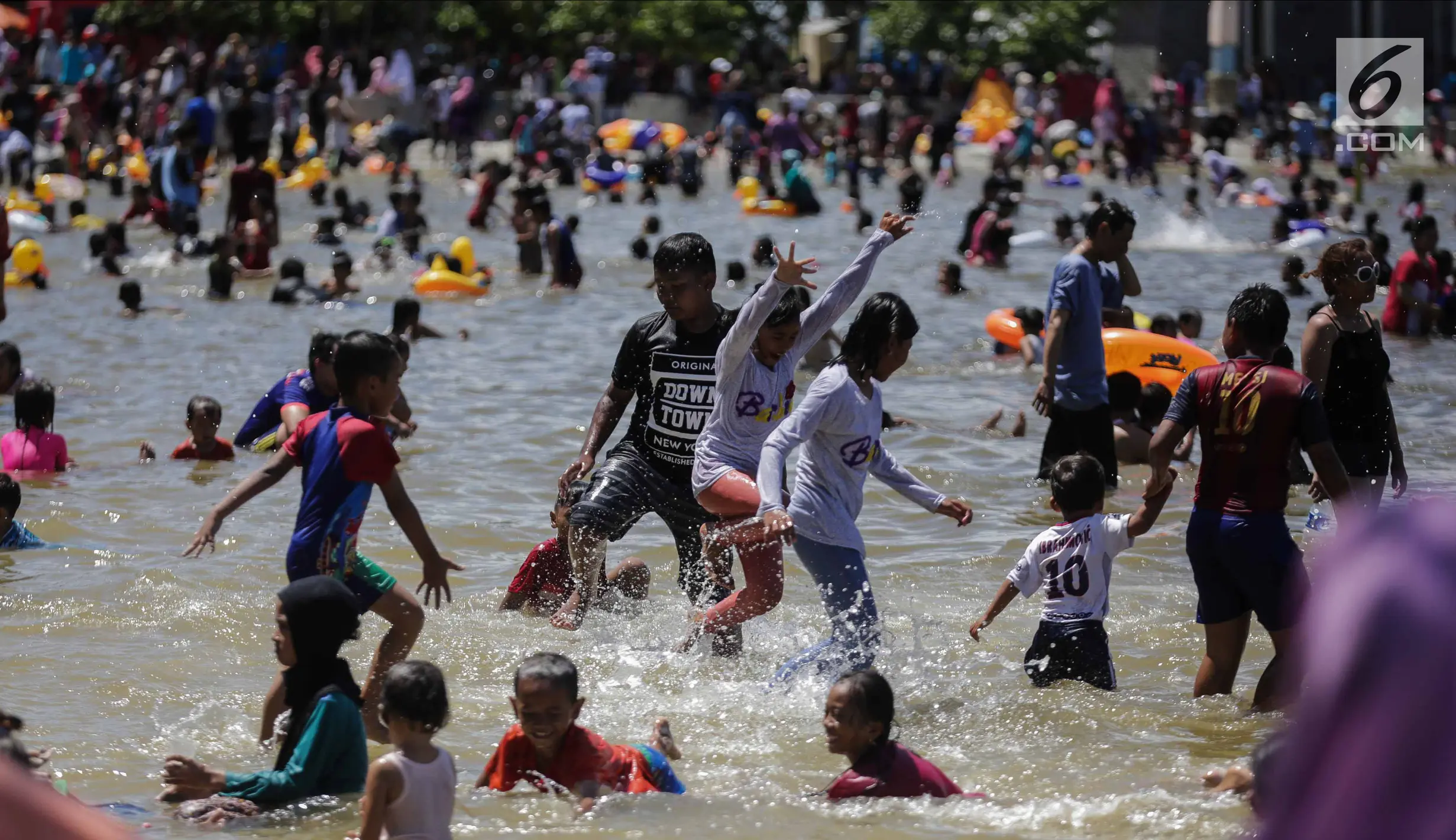 PHOTO: Libur Natal, Ancol Jadi Tujuan Wisata Murah Meriah di Jakarta - Foto Liputan6.com