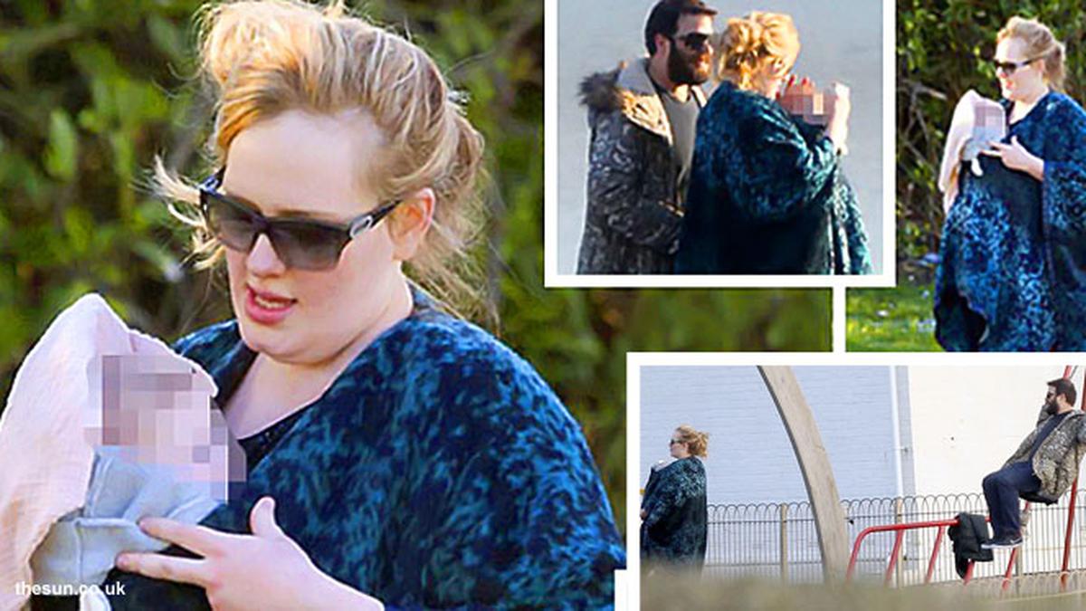 Jepret! Paparazi Dapat Foto Pertama Adele Menggendong Anaknya