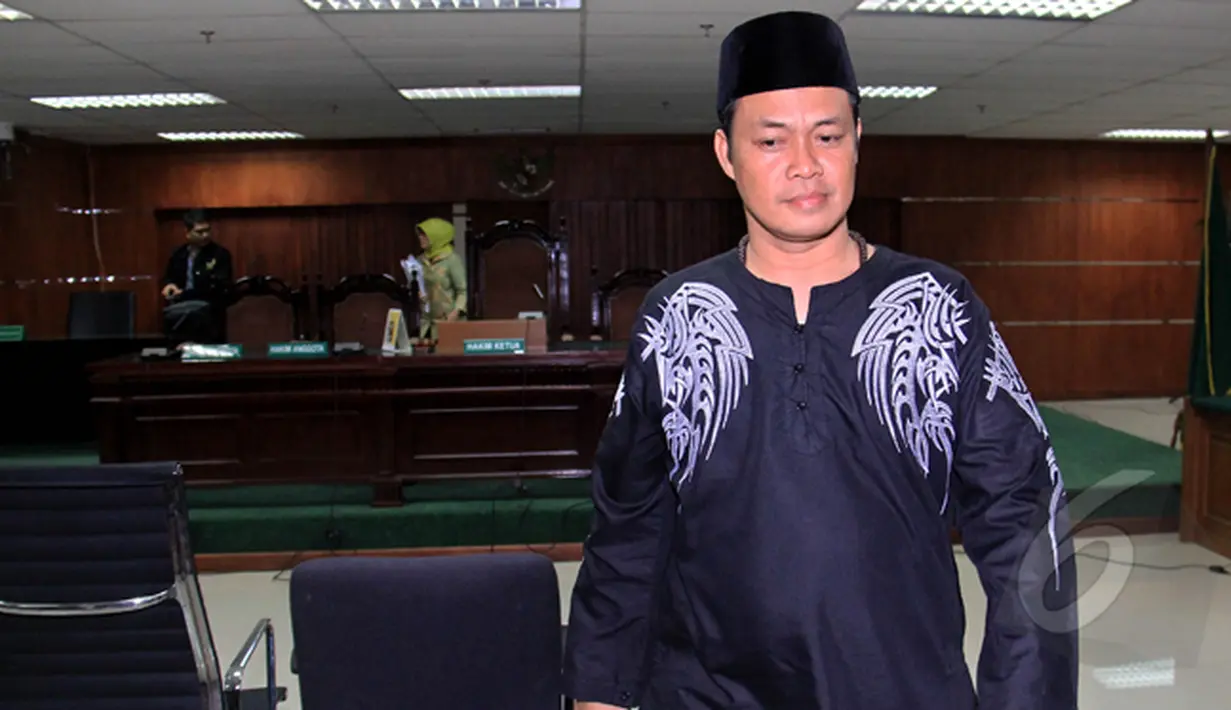 Tampang Muhtar Ependy Usai Divonis 5 Tahun Penjara - Foto Liputan6.com