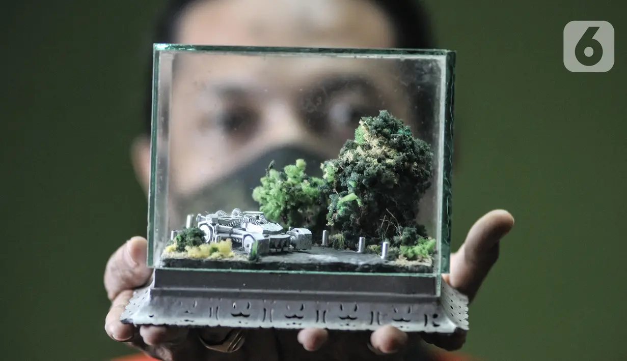 FOTO: Menyulap Sampah Korek Gas Jadi Miniatur Robot - Foto Liputan6.com