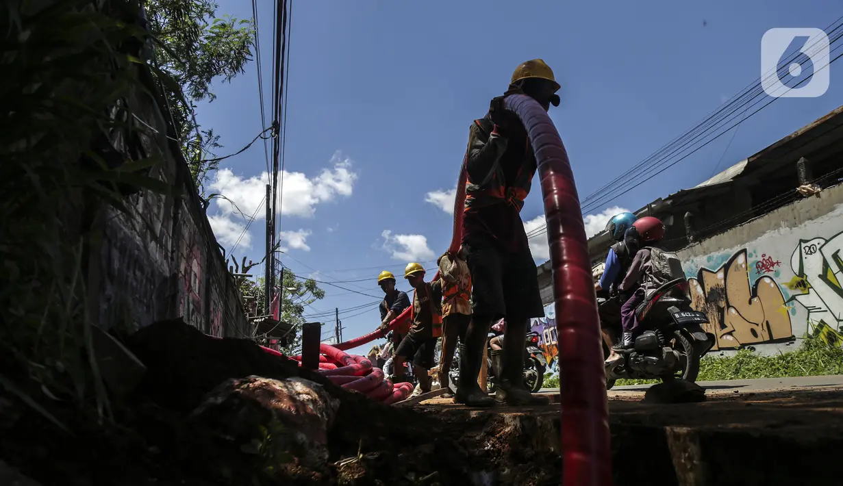 FOTO: Program Bantuan Pemerintah untuk Pekerja Informal - Foto Liputan6.com