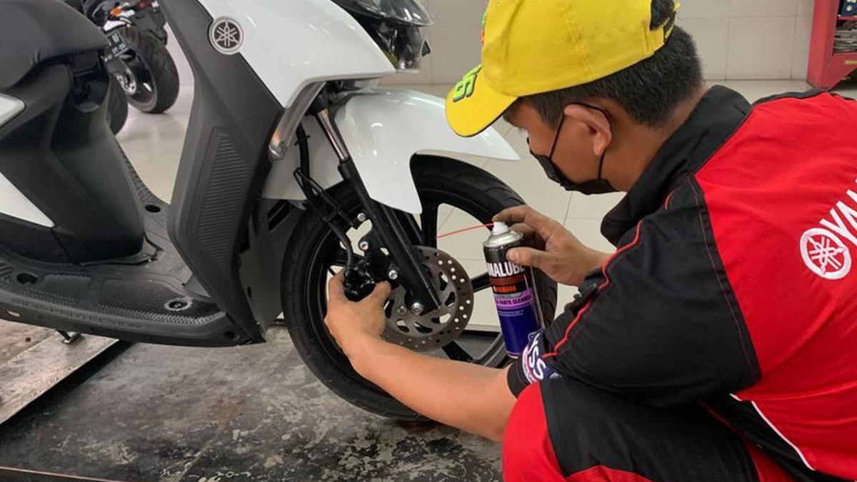 Merawat Rem Cakram Sepeda Motor Saat Musim Hujan - Berita Otosia.com