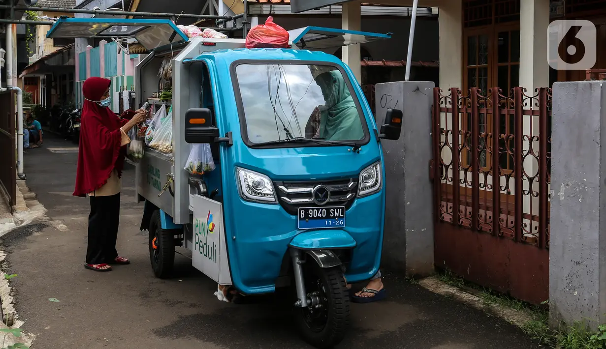 FOTO: Gerobak Motor Listrik Penjual Sayur - Foto Liputan6.com