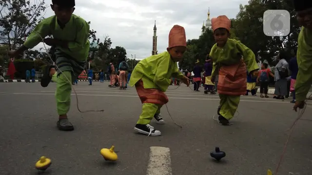 Gasing, Mainan Tradisional yang Punya Banyak Nama - Regional Liputan6.com