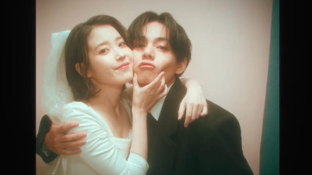 5 Potret Gaya Rambut IU dan V BTS dalam MV "Love Wins All" yang Mengagumkan