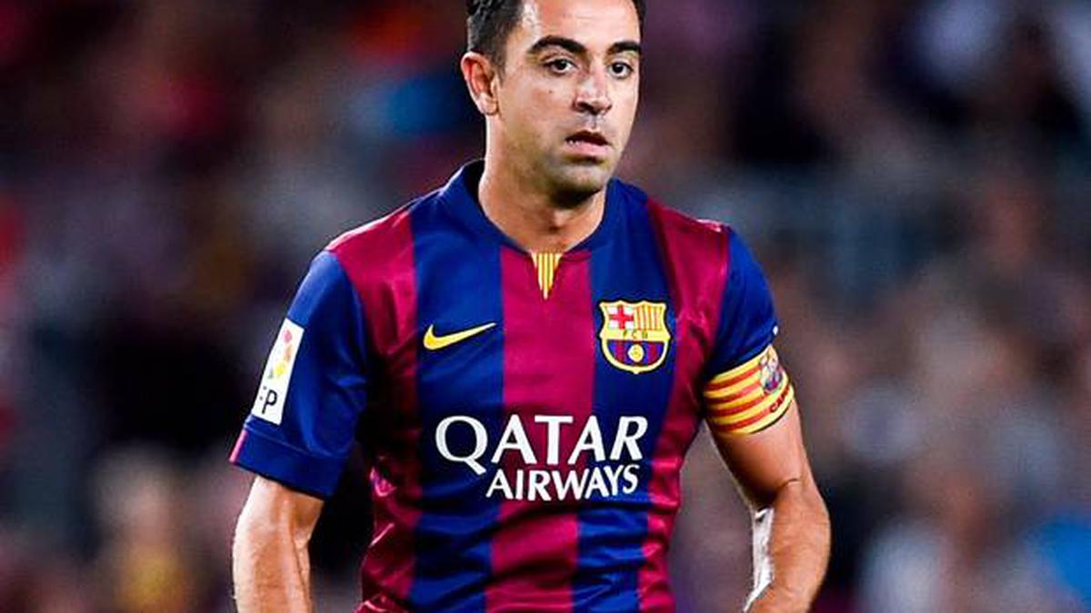 Xavi : Pep Guardiola Sang Revolusioner - Dunia Bola.com