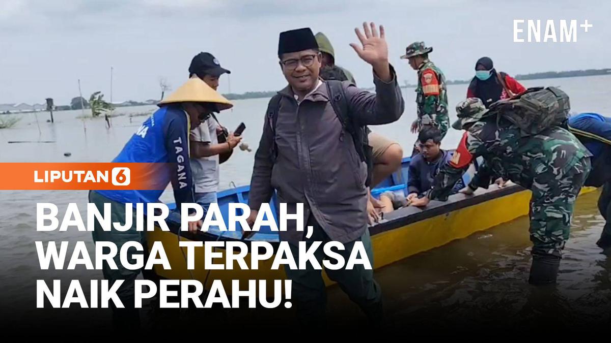 Ratusan Rumah Terendam Banjir, Warga Naik Perahu