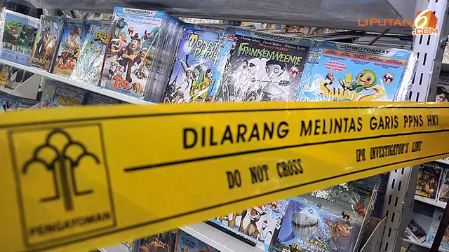FOTO: Razia VCD dan DVD Bajakan di Glodok - News Liputan6.com
