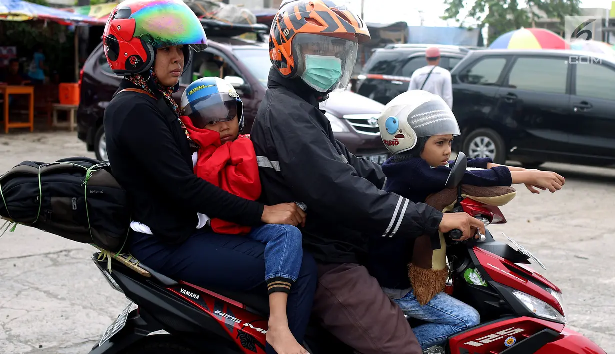 Suka Duka Mudik Naik Motor dan Bawa Anak - Foto Liputan6.com
