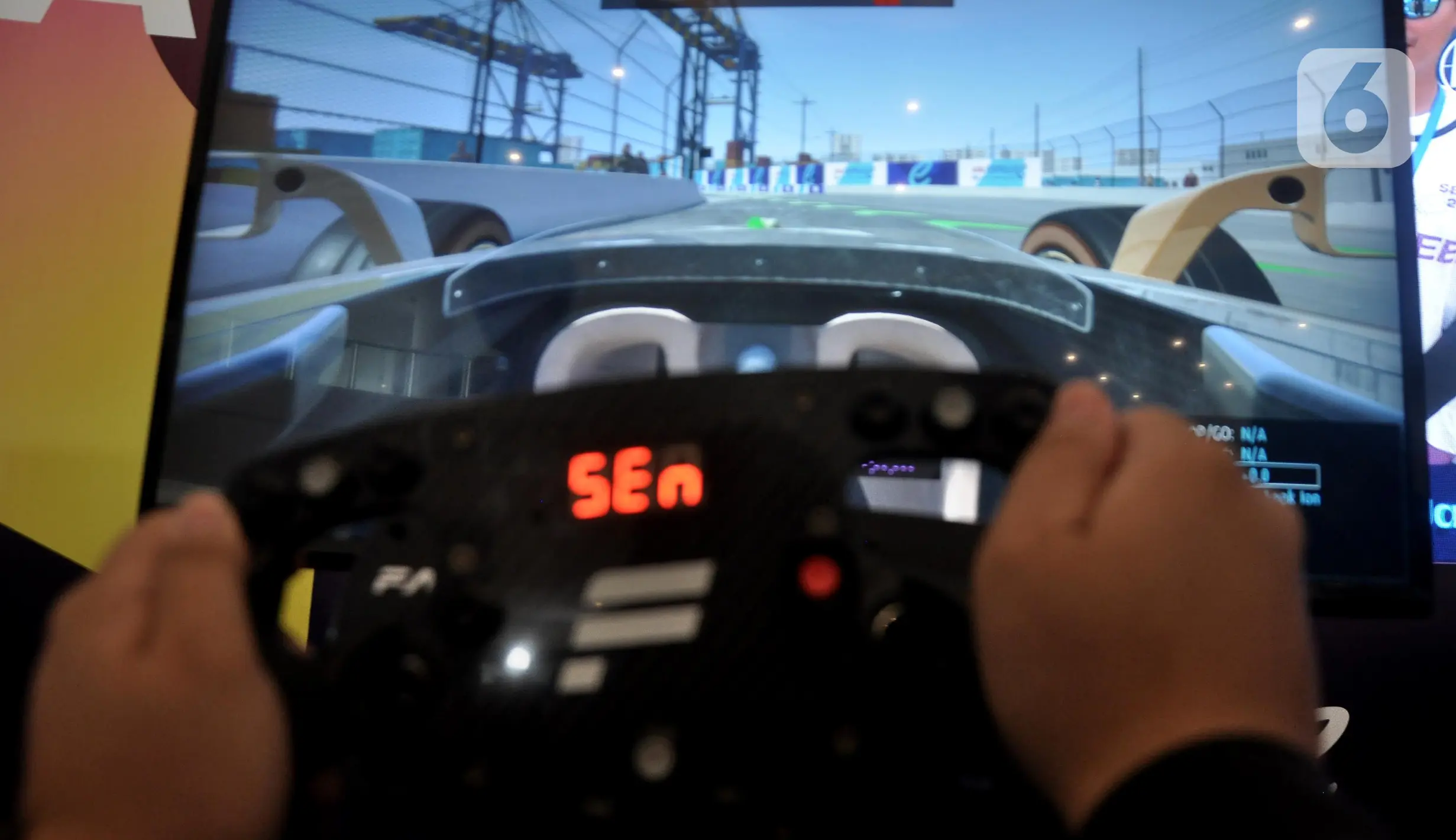 Keseruan Bermain Simulator Formula E - Foto Liputan6.com