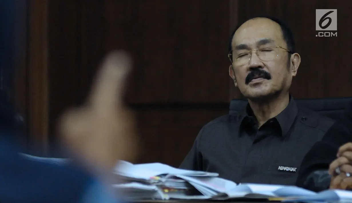 FOTO: Mantan Pengacara Setya Novanto Kembali Jalani Sidang Lanjutan - Foto Liputan6.com