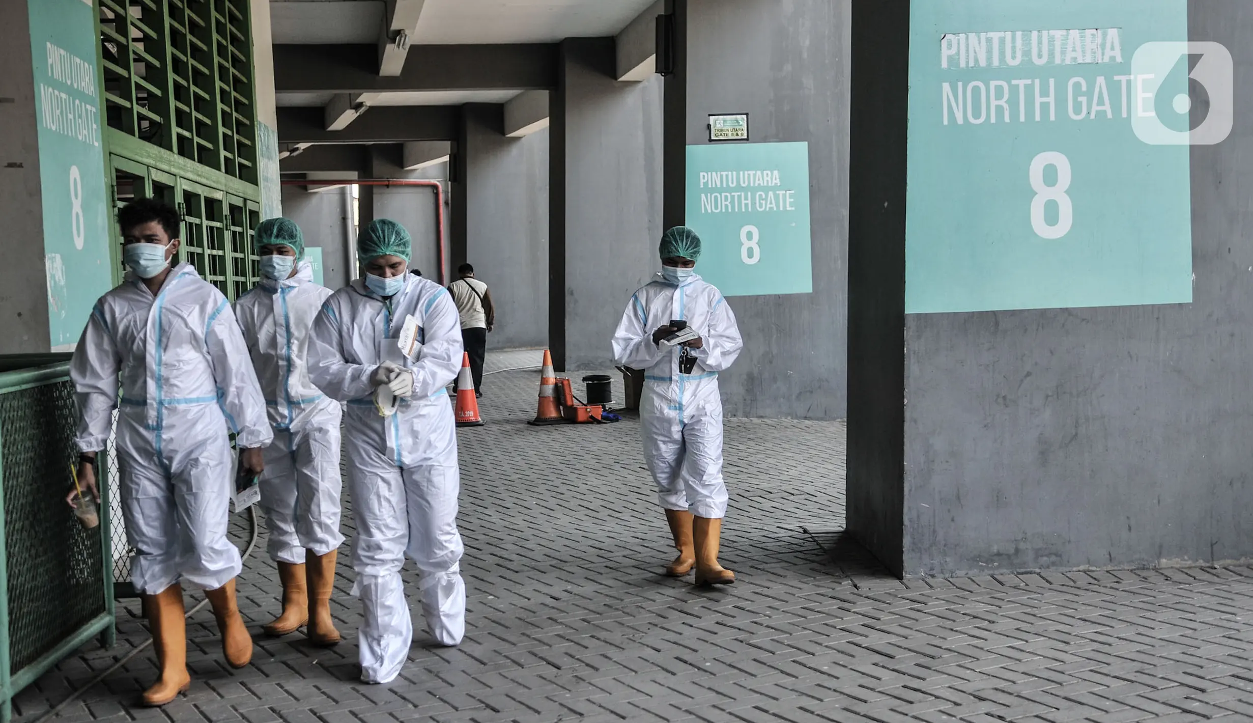 FOTO: Aktivitas Tempat Isolasi Mandiri Pasien Covid-19 di Stadion ...