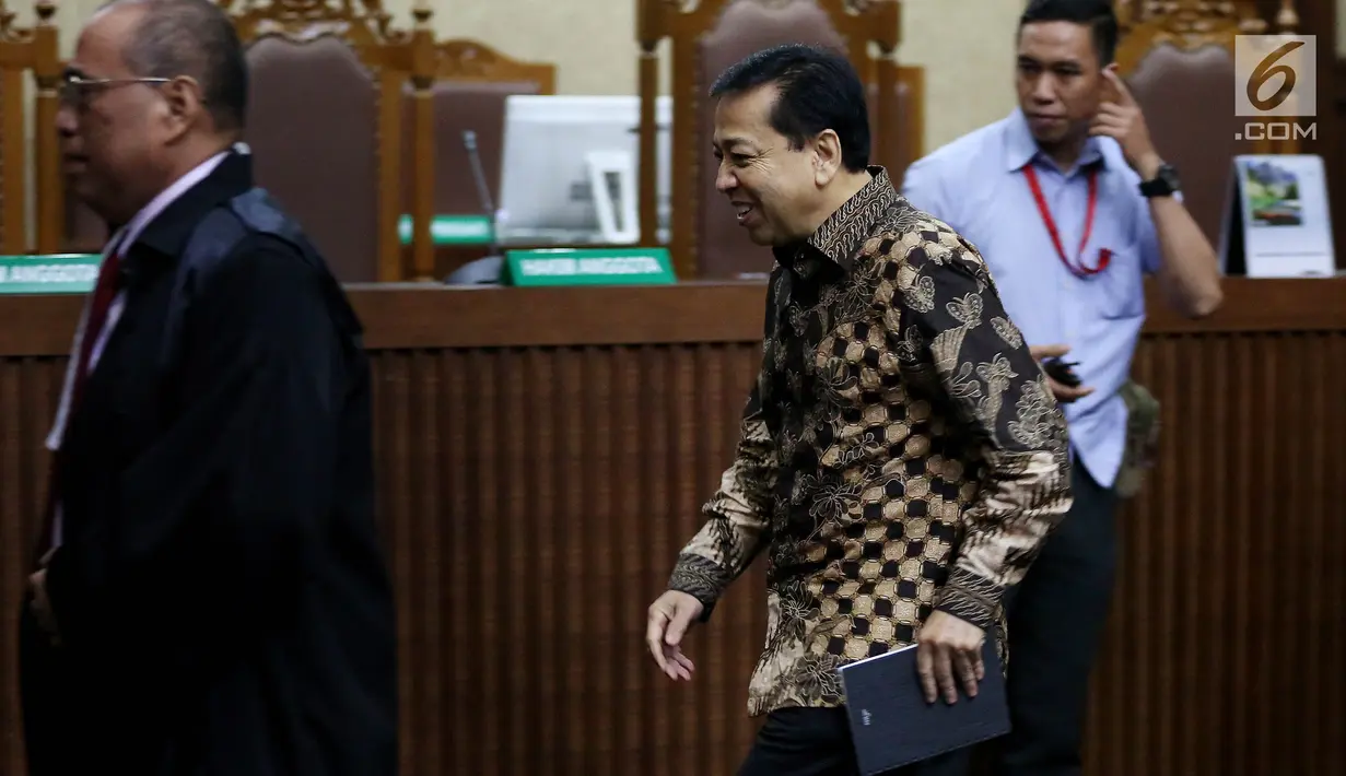 FOTO: Pasrahnya Setya Novanto Eksepsi Ditolak Hakim - Foto Liputan6.com