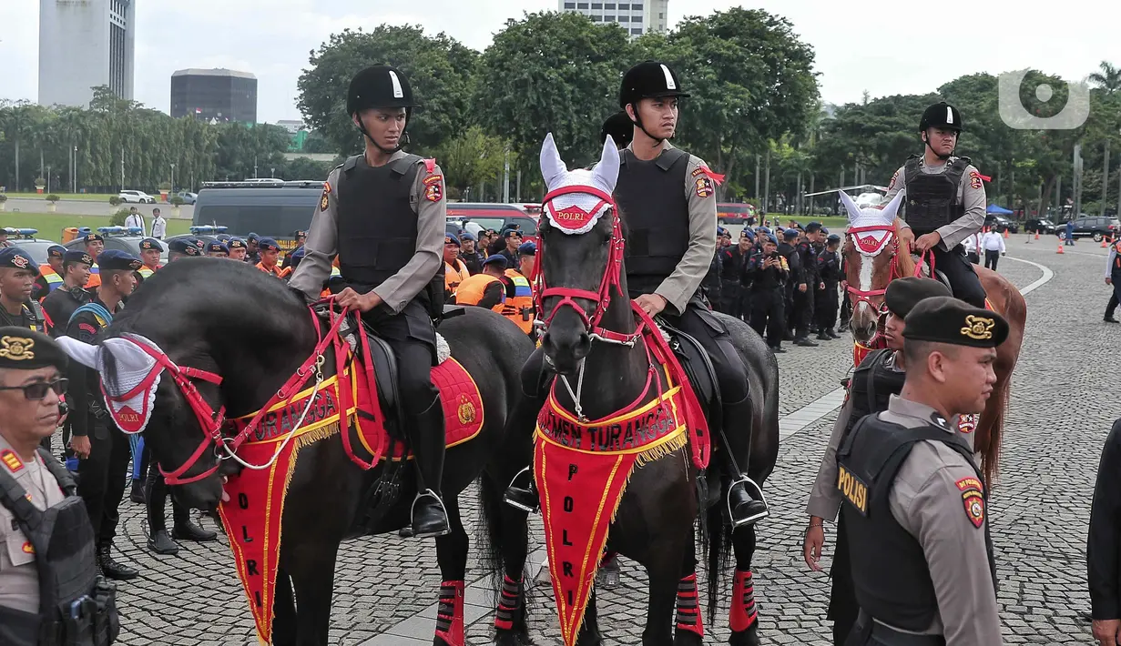 Panglima TNI dan Kapolri Pimpin Apel Operasi Lilin 2022 di Monas - Foto Liputan6.com