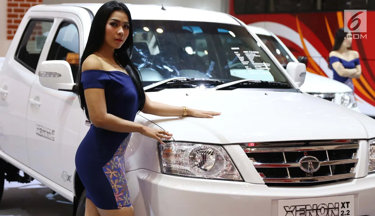 PHOTO: Pose-Pose SPG Cantik di Ajang GIIAS 2017 - Foto Liputan6.com