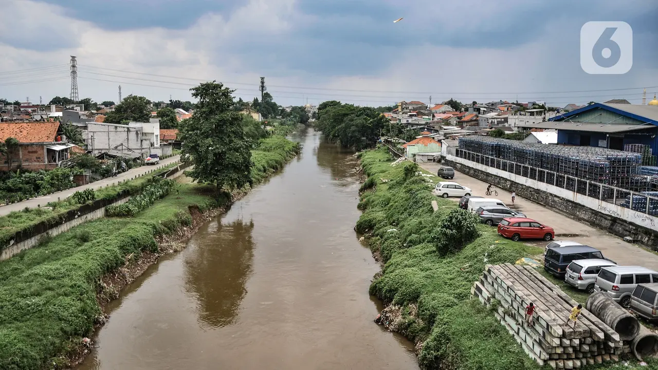 Hujan Lebat di Jakarta, Pintu Air Manggarai Siaga 3 - News Liputan6.com