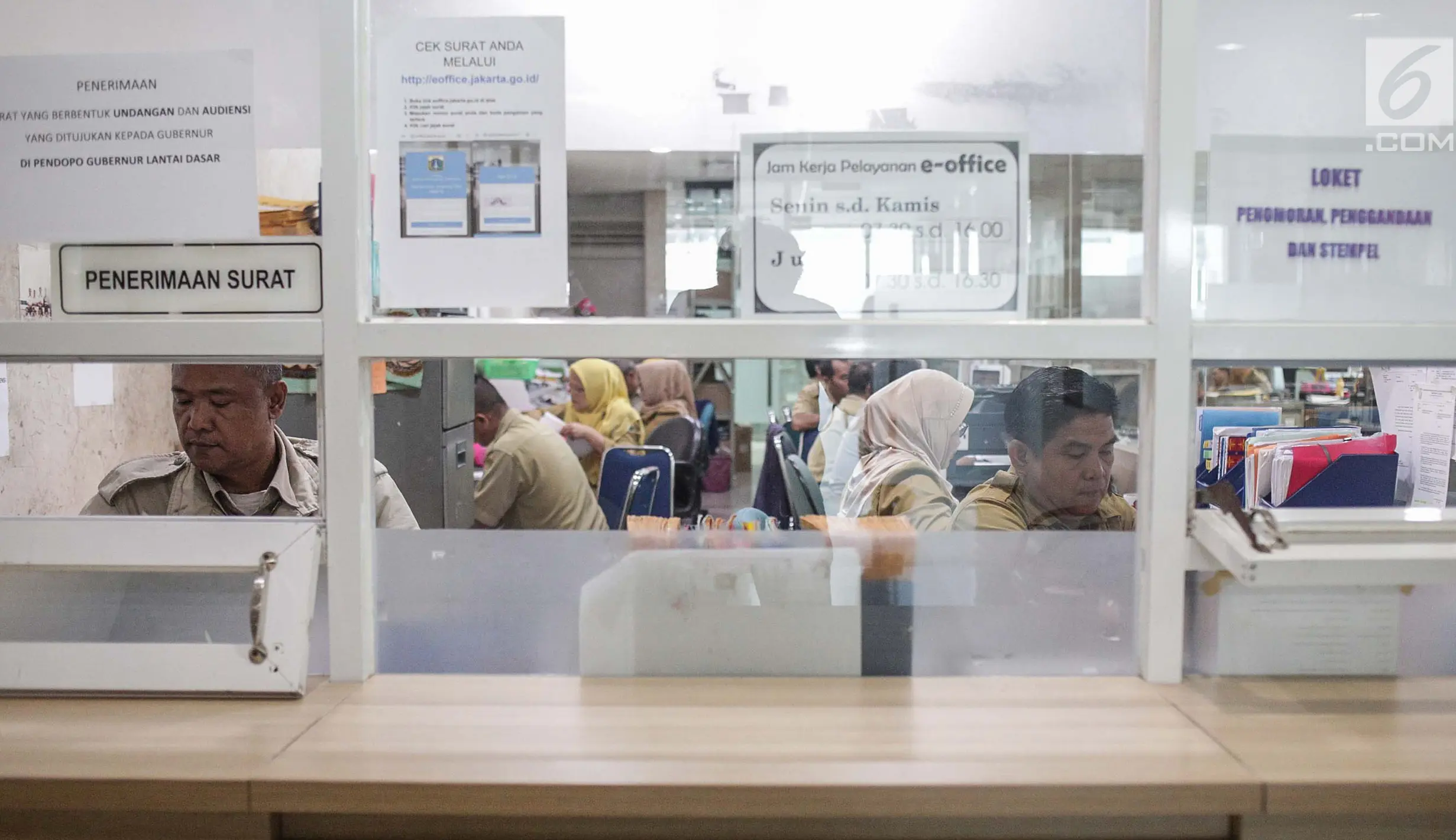 FOTO: Usai Libur Lebaran, PNS DKI Jakarta Langsung Aktif Bekerja - Foto ...