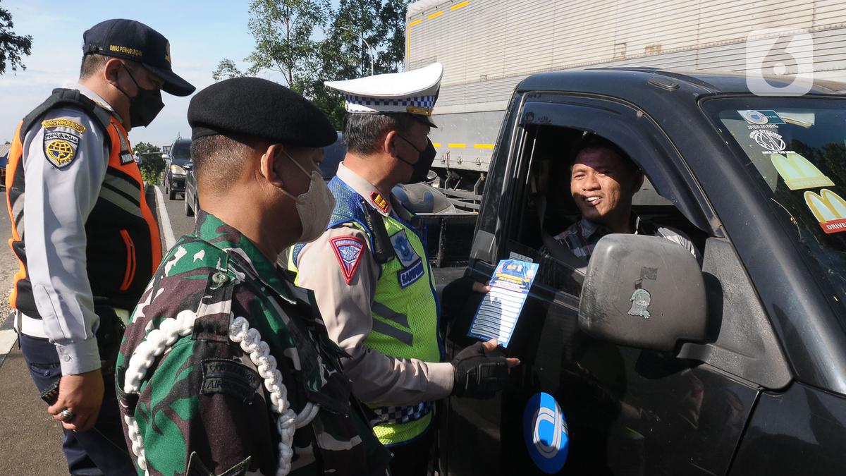 Petugas Gabungan Gelar Operasi Keselamatan Lalu Lintas 2024 - Foto Liputan6.com