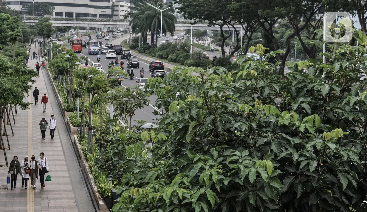FOTO: Pembatasan 25 Persen Pekerja Kantoran di Jakarta - Foto Liputan6.com