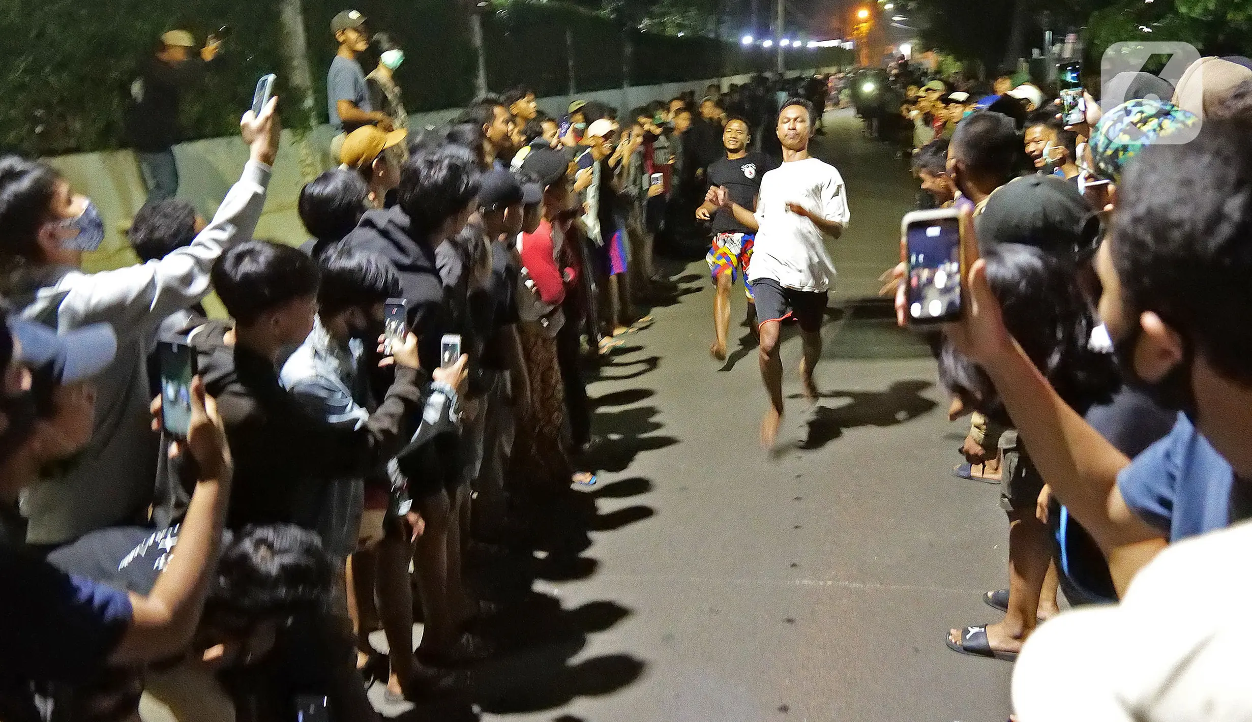 FOTO: Aksi Balap Lari Liar di Bogor - Foto Liputan6.com