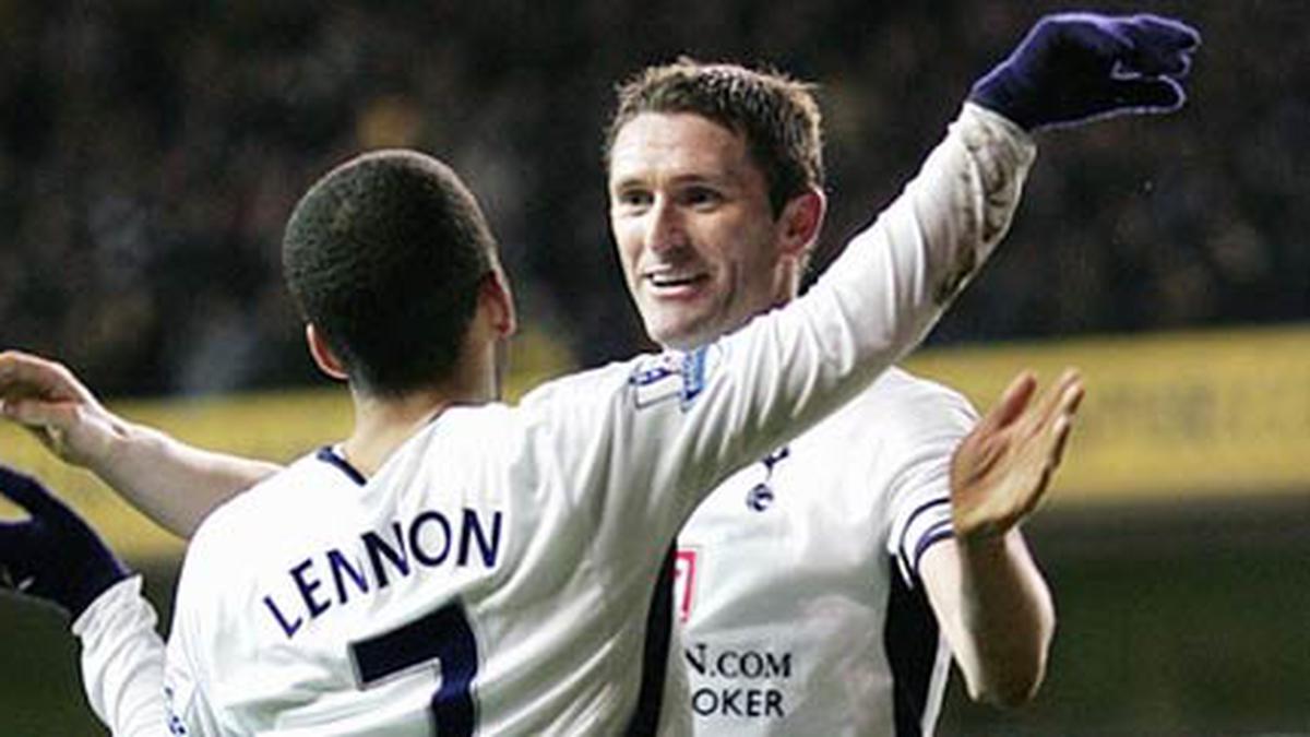 Aaron Lennon & Robbie Keane (© AFP 2009) - Foto Liputan6.com