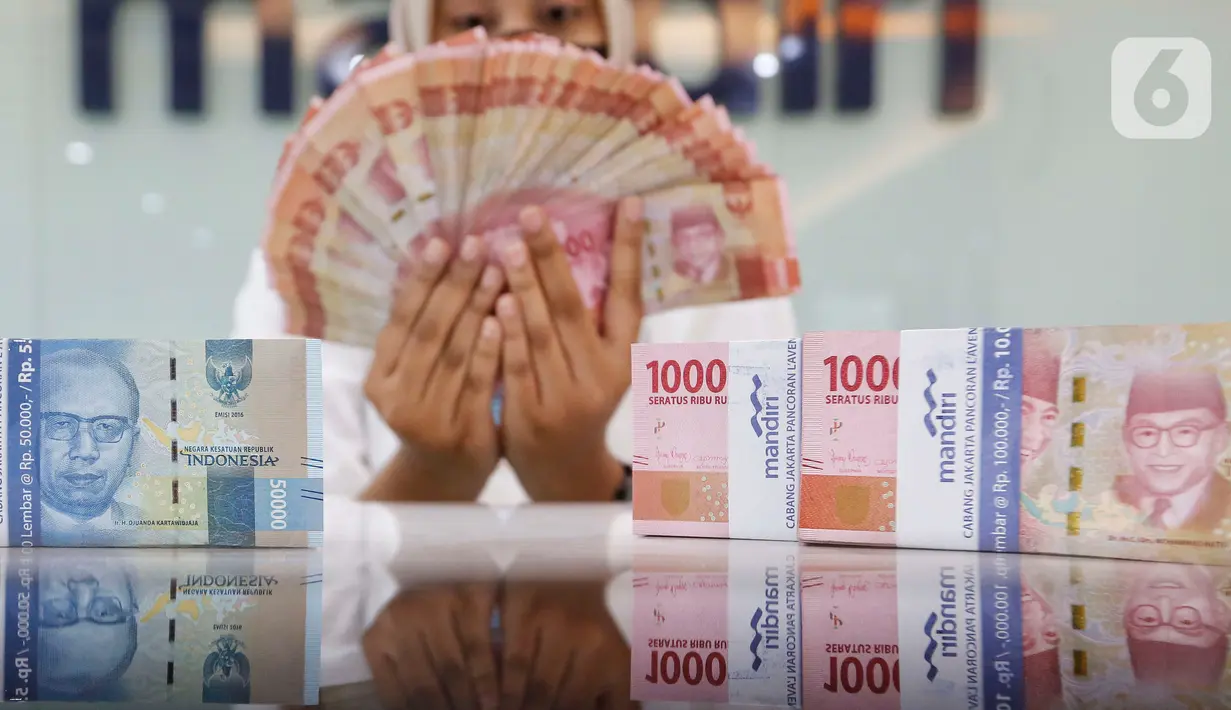 Akhir Pekan, Rupiah Melemah Terhadap Dolar - Foto Liputan6.com
