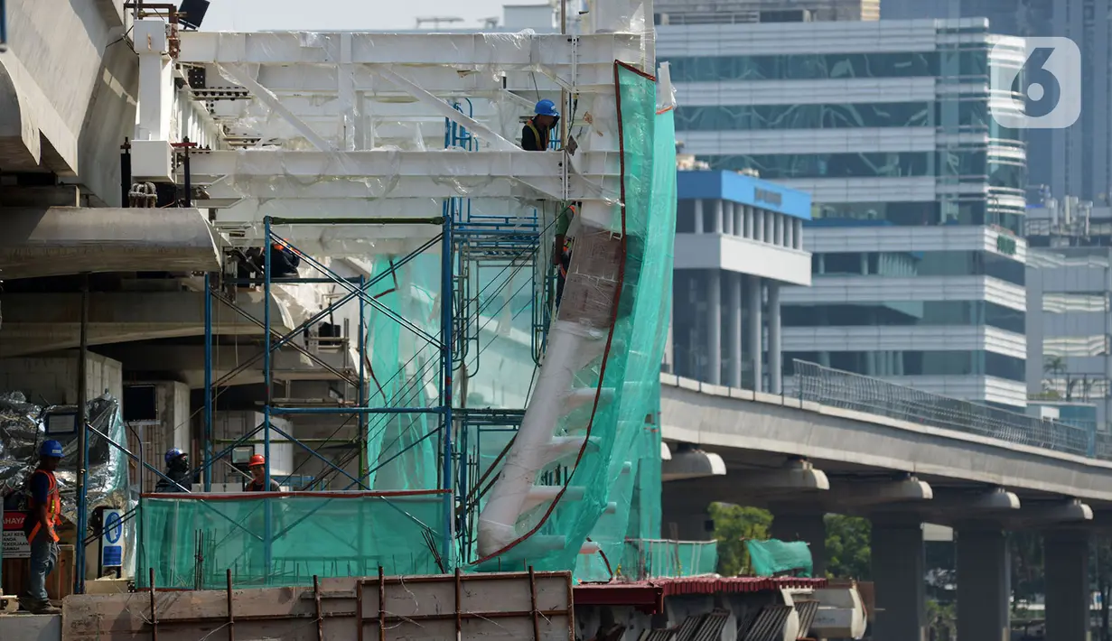 FOTO: Perkembangan Stasiun LRT Kawasan Kuningan Jakarta - Foto Liputan6.com